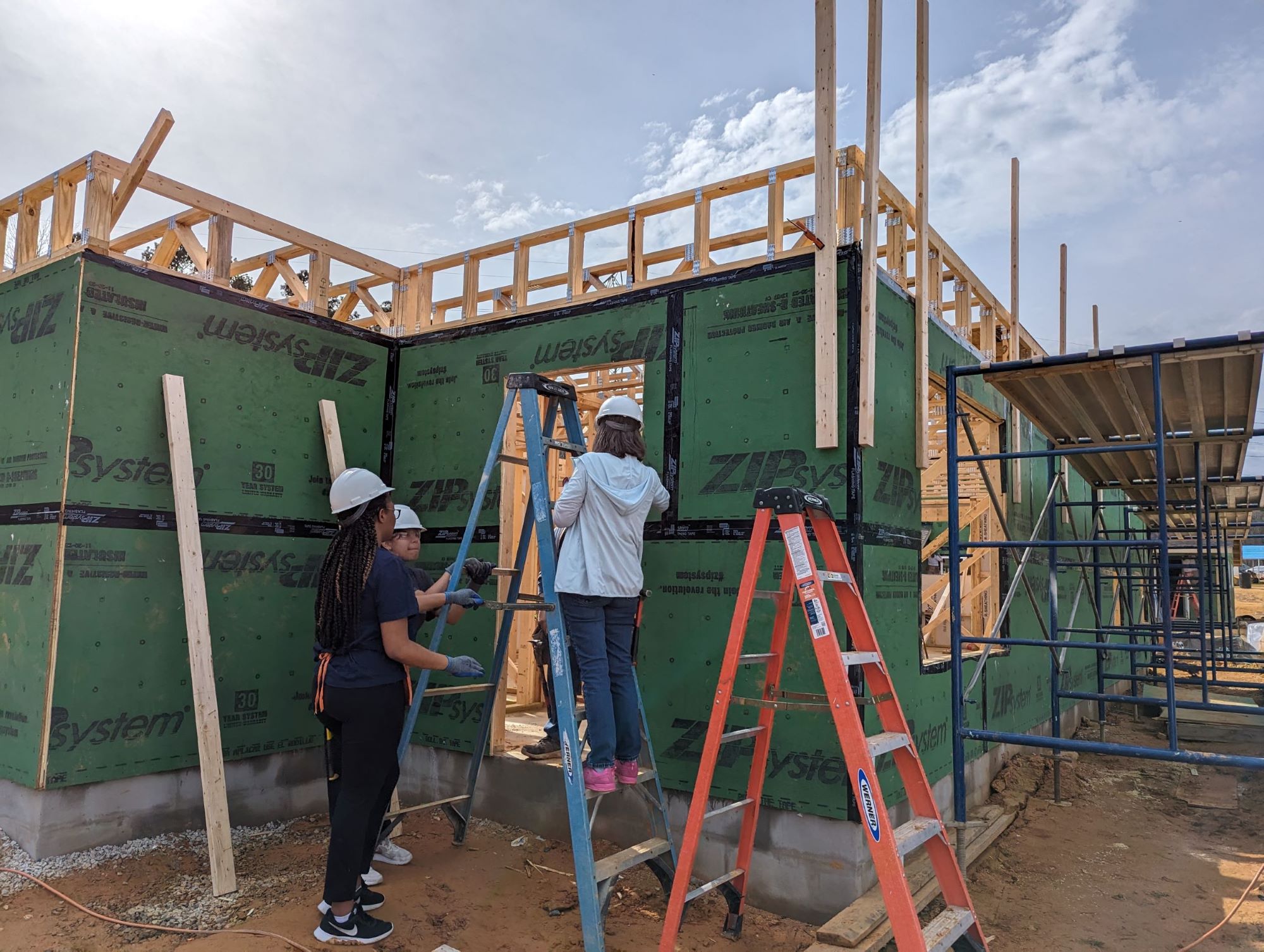 "Building Pride" Can Be Bridgebuilding Too: Habitat for Humanity Teams ...